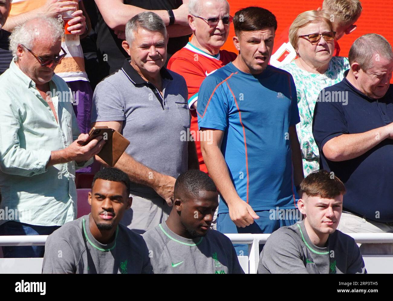 Liverpool's Ryan Gravenburch (left) on the bench ahead of the Premier ...