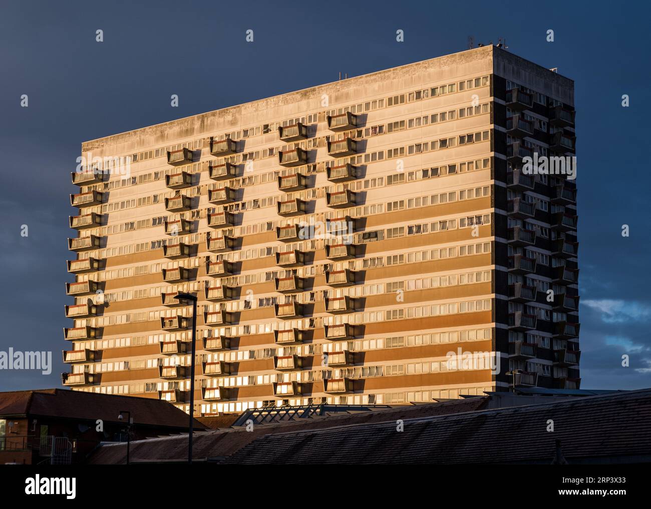 Sunset shines on Inkerman House, a run down 12-storey tower block ...