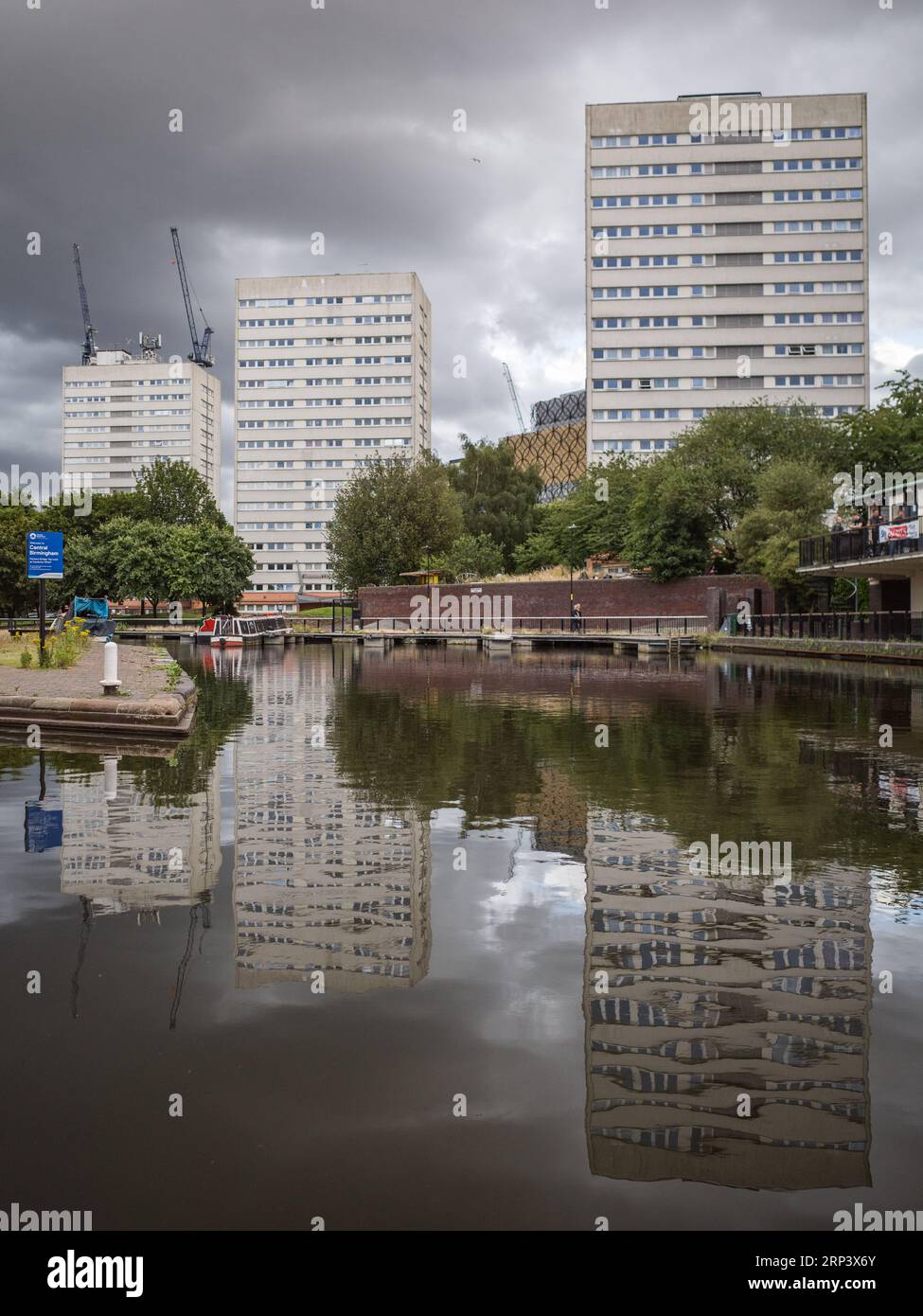 Three 1960's High-Rise tower blocks reflect in the nearby canal, Civic ...