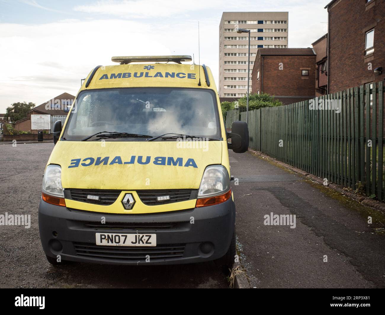 A vandalised ambulance is abandoned in a run down housing estate in the ...