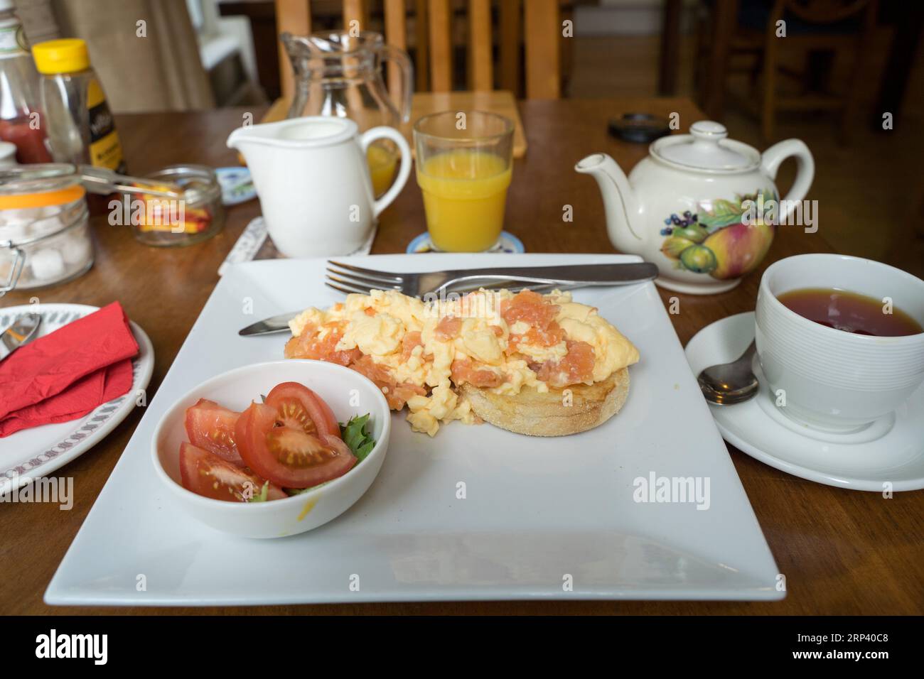 full English breakfast served with Scrambled eggs with salmon , tea and ...