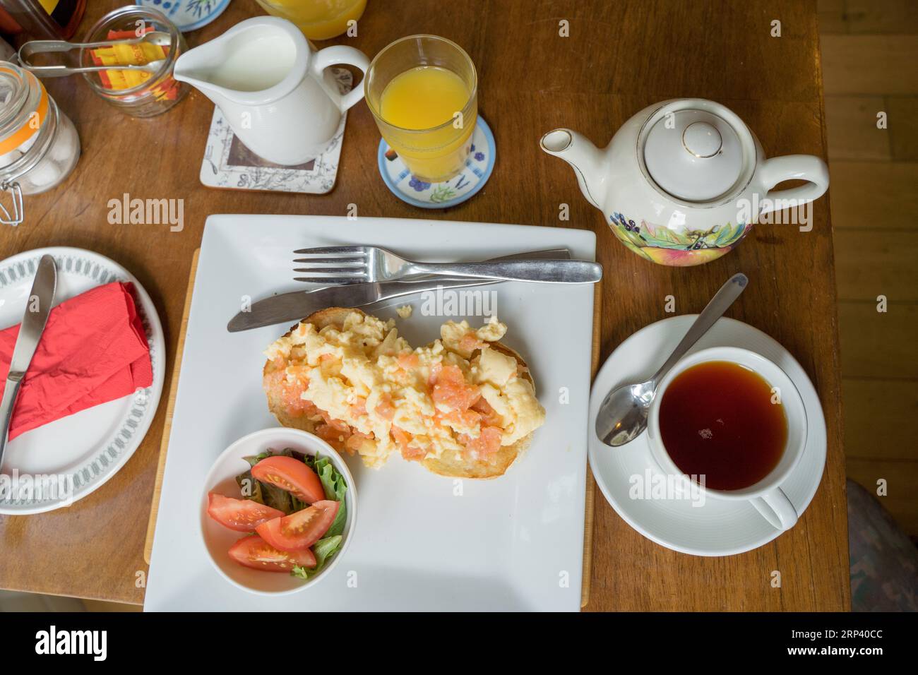 full English breakfast served with Scrambled eggs with salmon , tea and ...