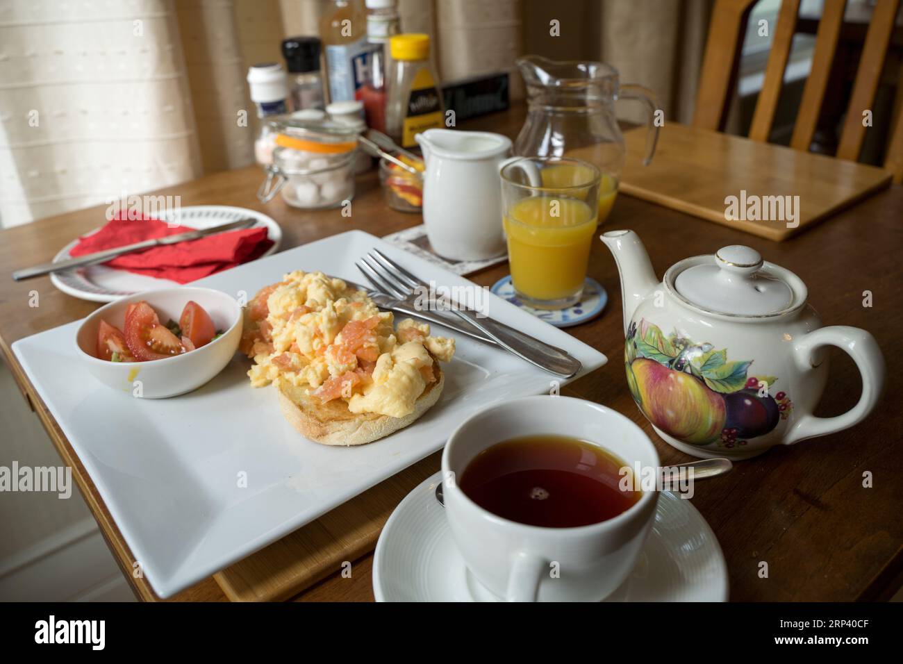full English breakfast served with Scrambled eggs with salmon , tea and ...
