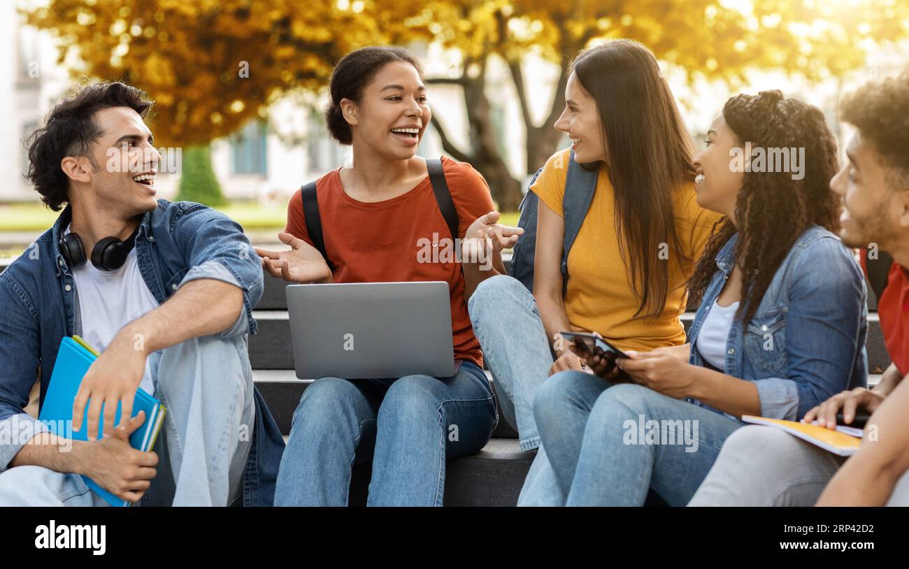 Multiethnic students in university park hi-res stock photography and ...