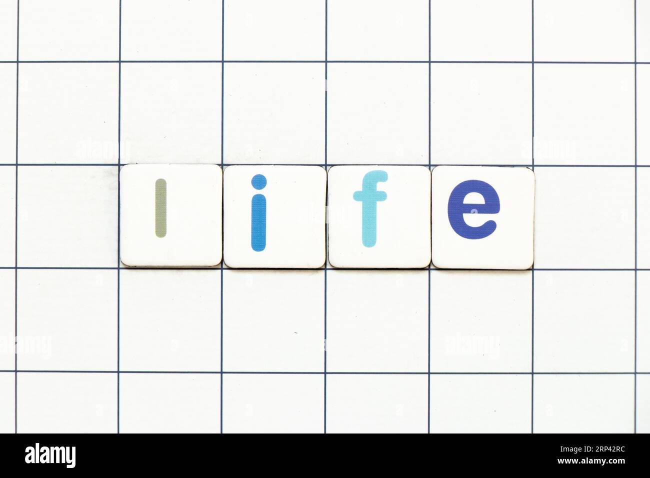 Colorful tile letter in word life on white grid background Stock Photo ...