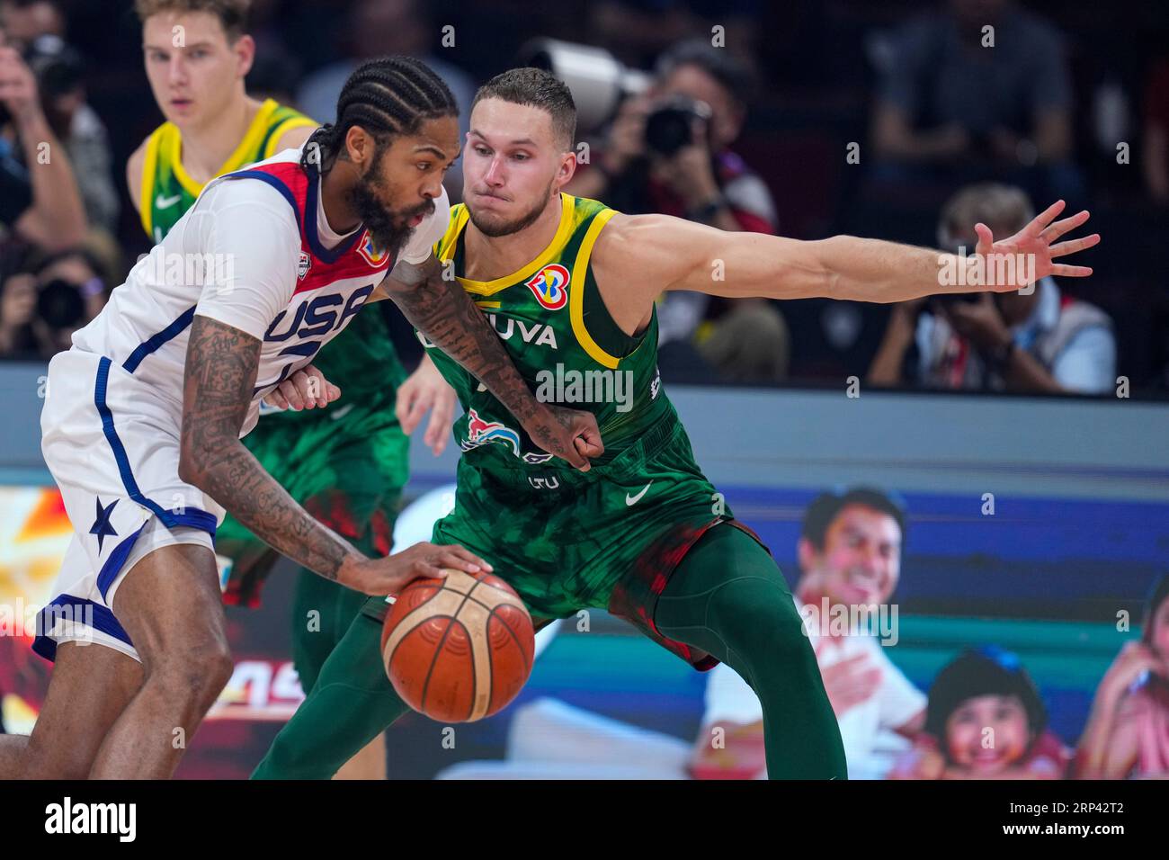 U.S. forward Brandon Ingram (7) drives on Lithuania forward Tadas ...