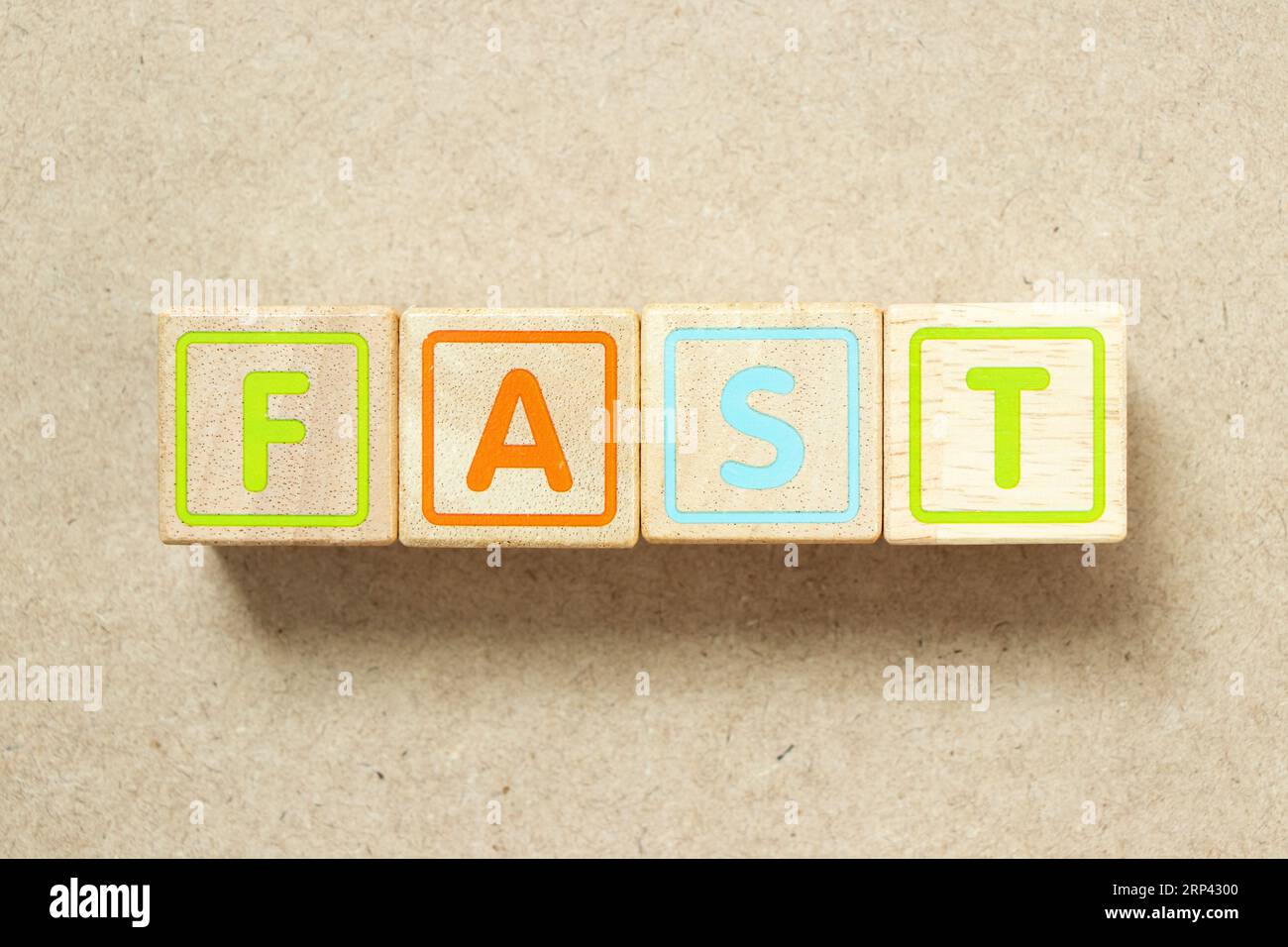 Wooden alphabet letter block in word fast on wood background Stock ...