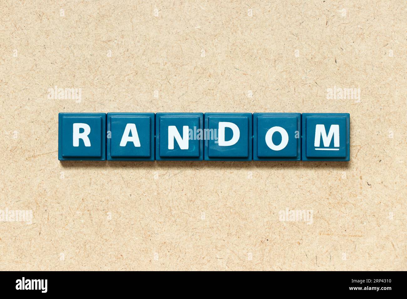 Tile alphabet letter in word random on wood background Stock Photo - Alamy