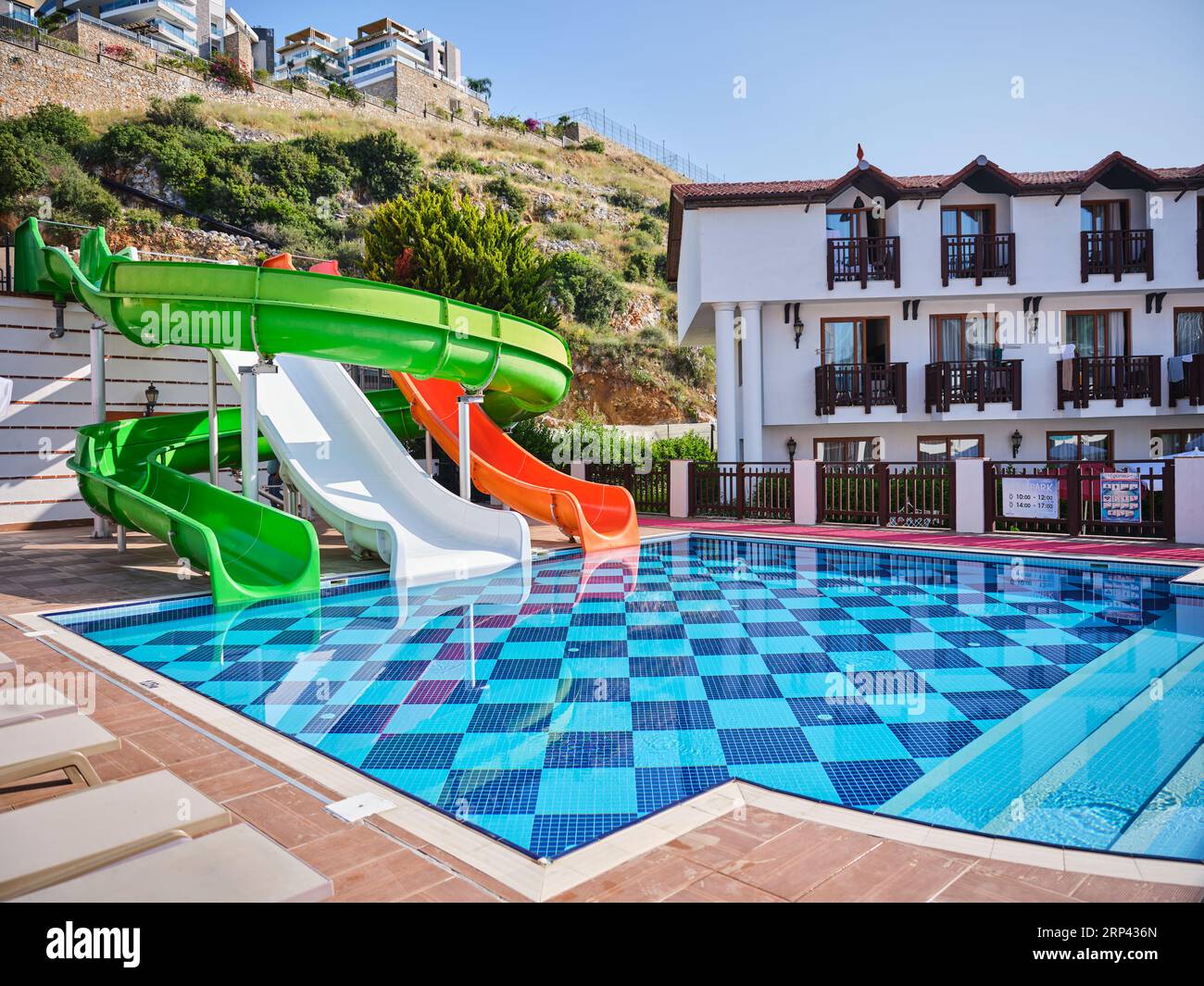Hotel swimming pool water slide hi-res stock photography and images - Alamy