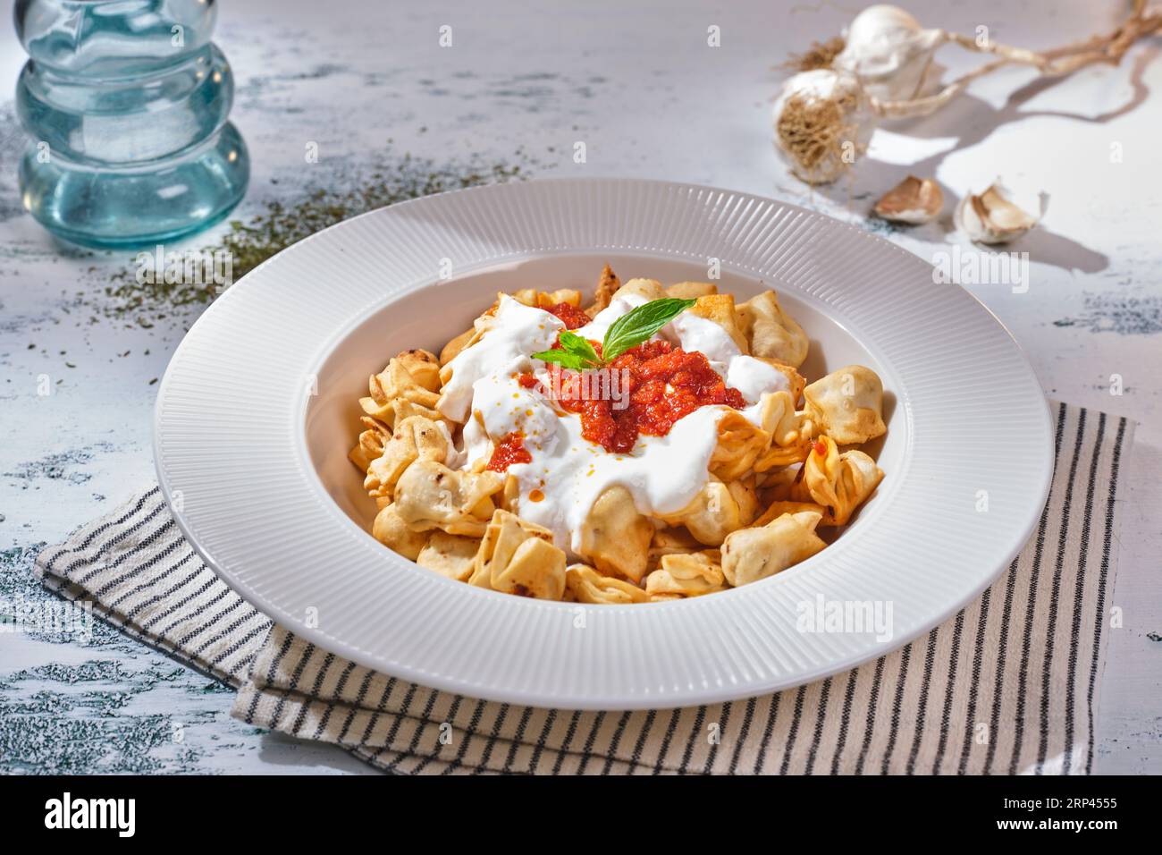 Traditional Turkish food and Ravioli, Manti, on a beautiful background ...
