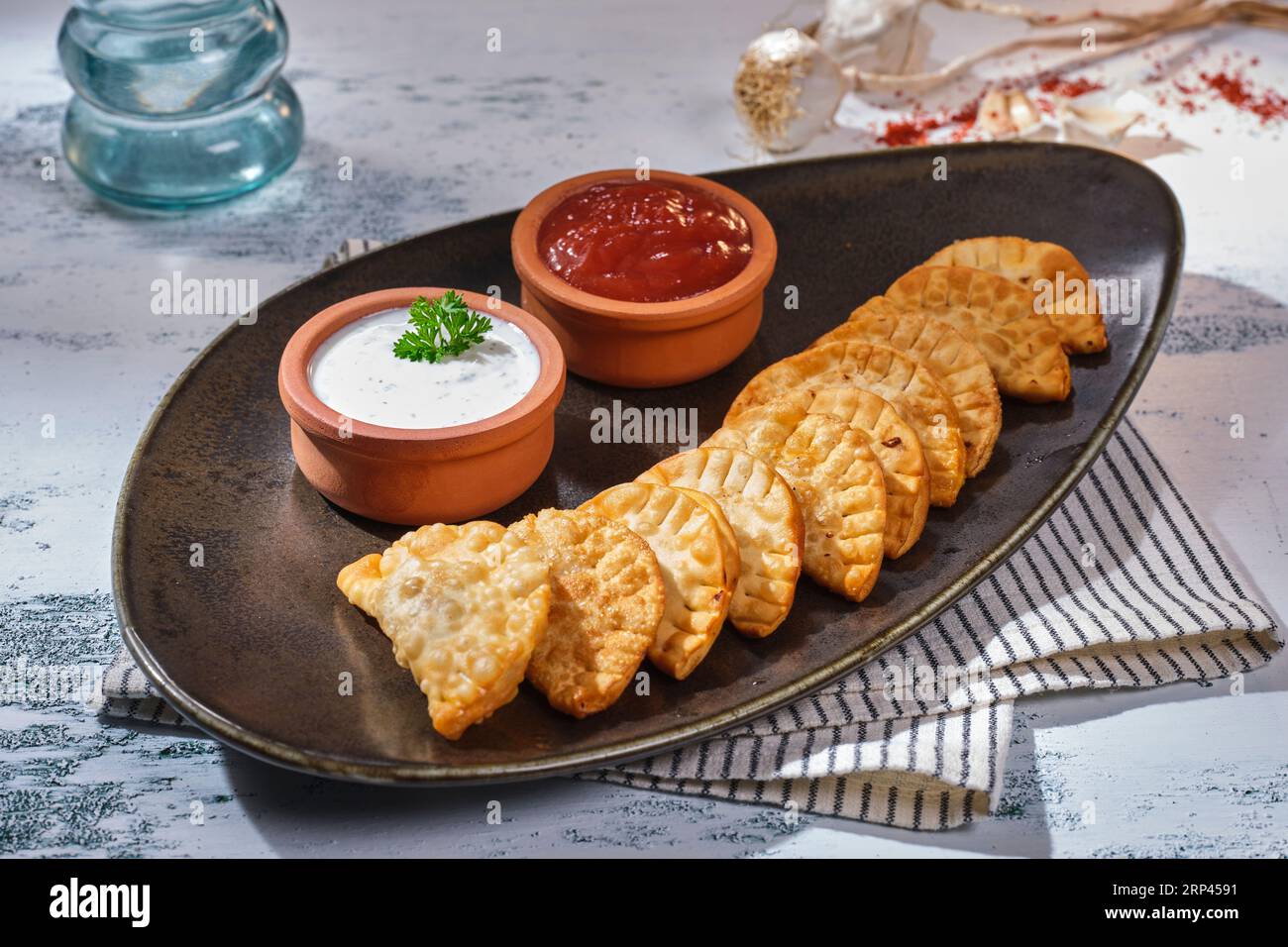 Traditional Turkish food and Ravioli, Manti, on a beautiful background ...