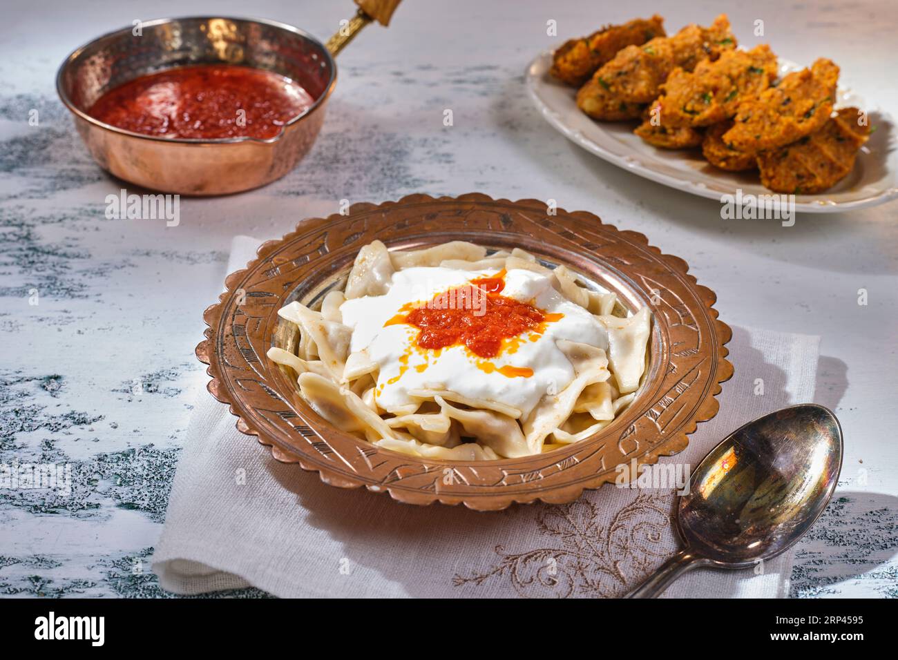 Traditional Turkish food and Ravioli, Manti, on a beautiful background ...