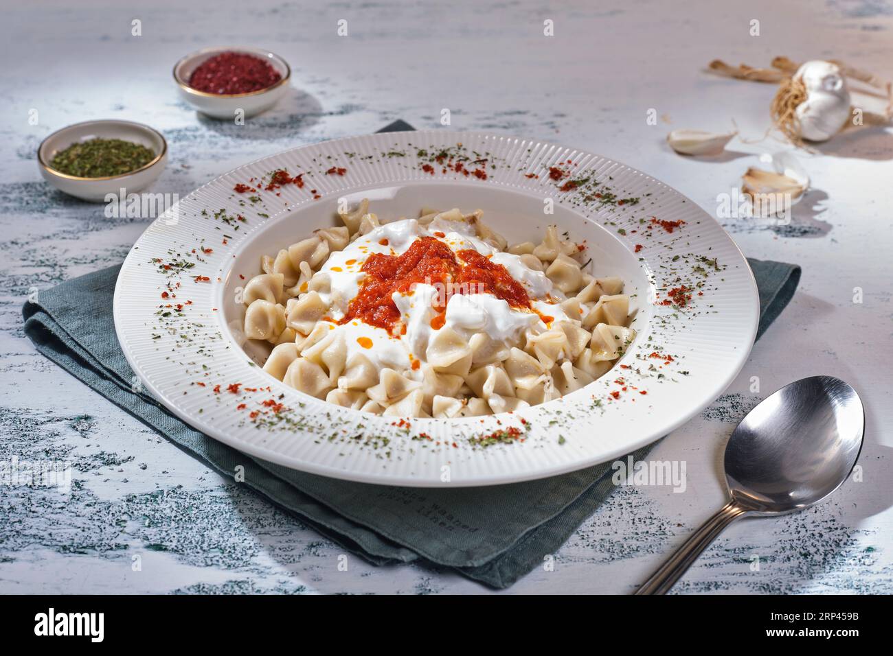 Traditional Turkish food and Ravioli, Manti, on a beautiful background ...
