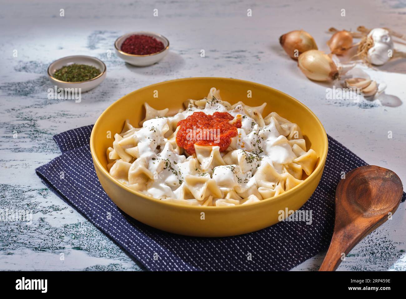 Traditional Turkish food and Ravioli, Manti, on a beautiful background ...