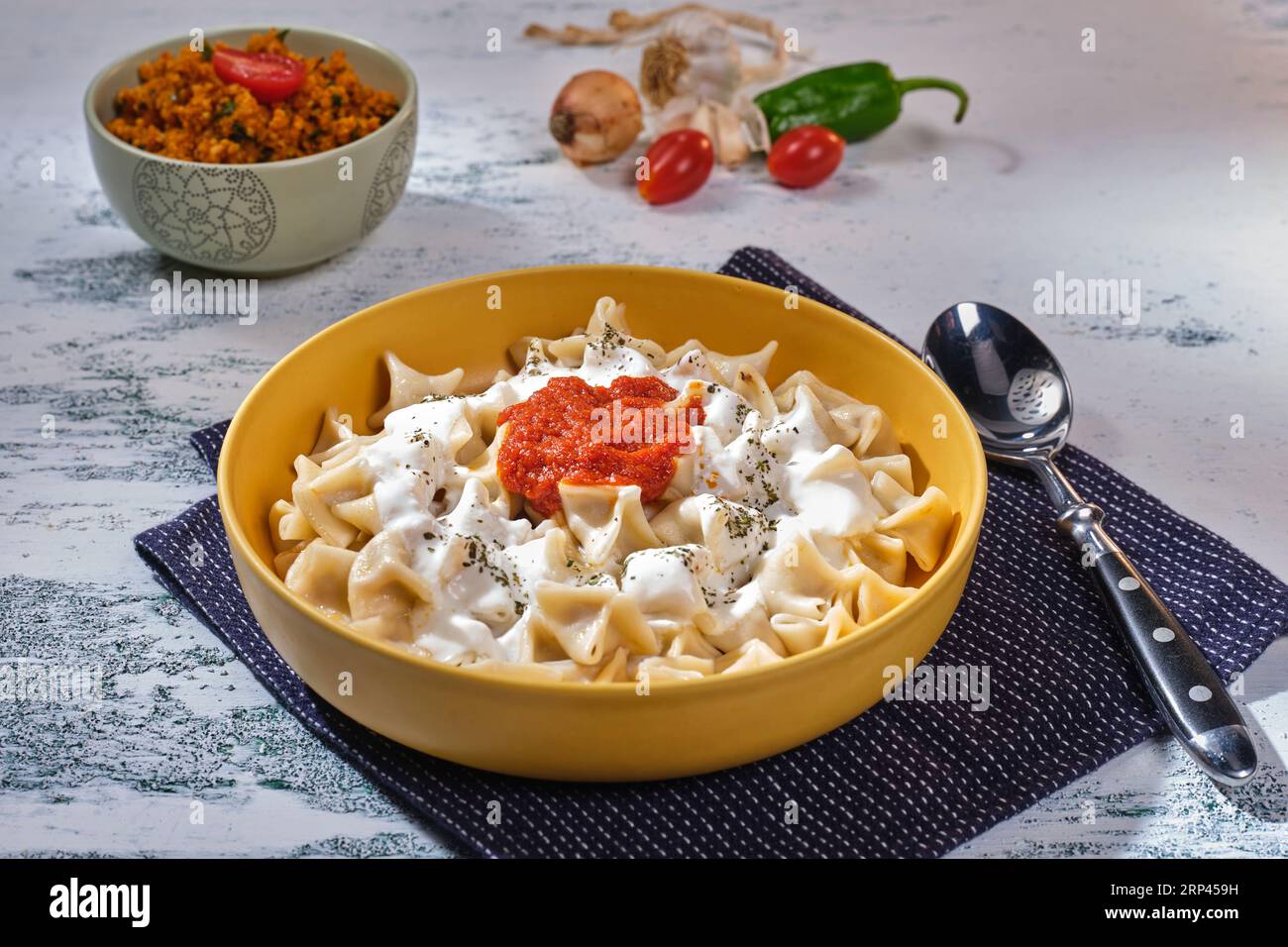 Traditional Turkish food and Ravioli, Manti, on a beautiful background ...