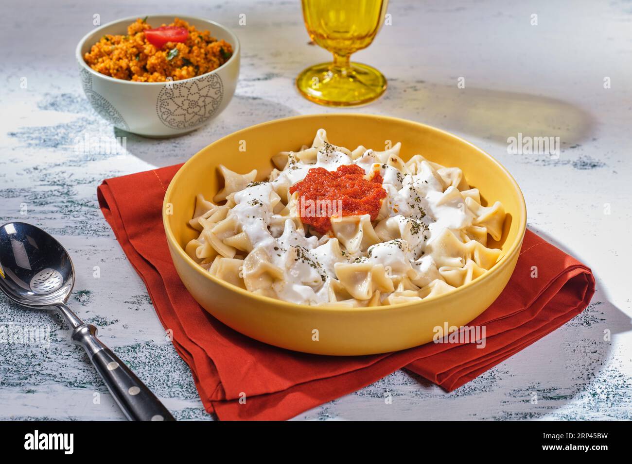 Traditional Turkish food and Ravioli, Manti, on a beautiful background ...