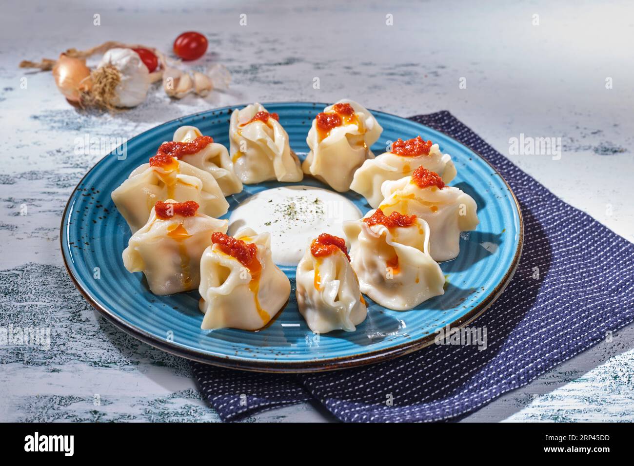 Traditional Turkish food and Ravioli, Manti, on a beautiful background ...