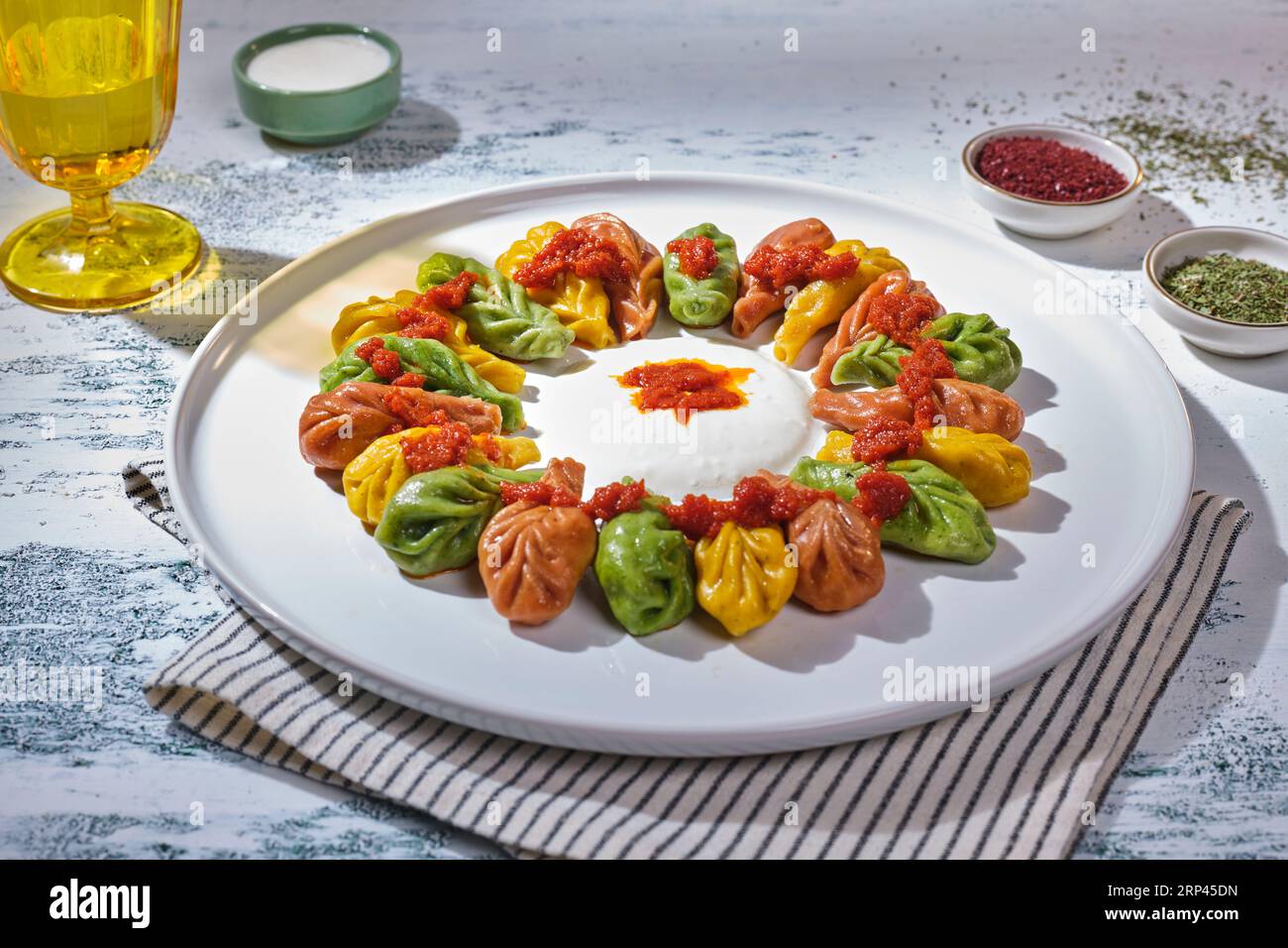 Traditional Turkish food and Ravioli, Manti, on a beautiful background ...