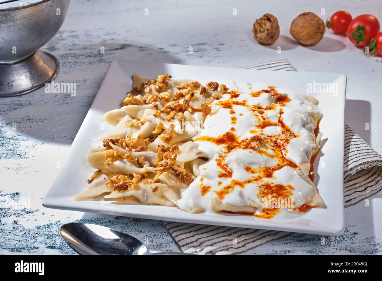 Traditional Turkish food and Ravioli, Manti, on a beautiful background ...