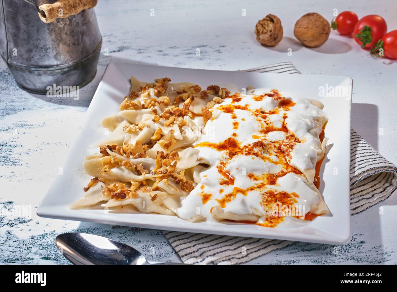 Traditional Turkish food and Ravioli, Manti, on a beautiful background ...