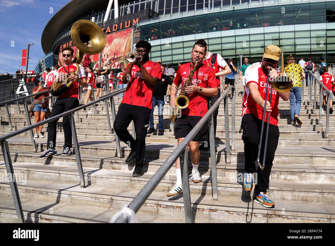 A brass band plays outside the stadium ahead of the Premier League ...