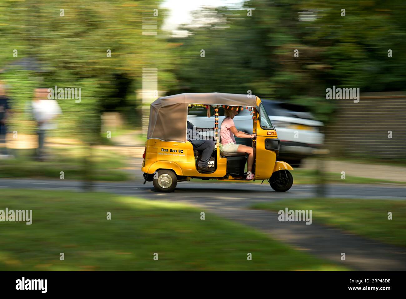 Tuk Tuk go at Redbourn Motor Show driving people around Stock Photo - Alamy