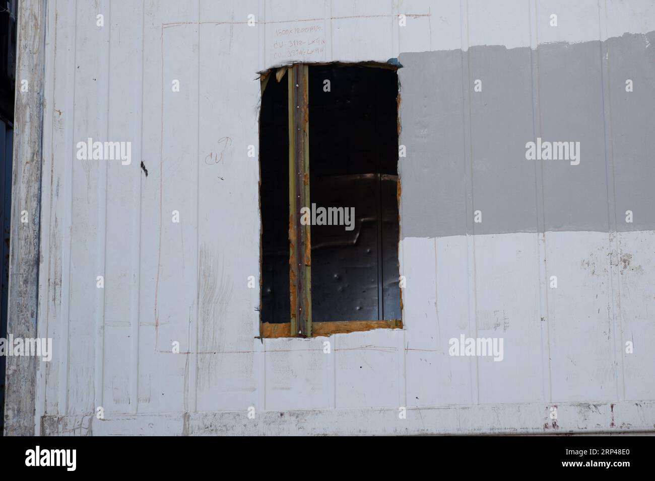 The container wall was damaged Stock Photo - Alamy