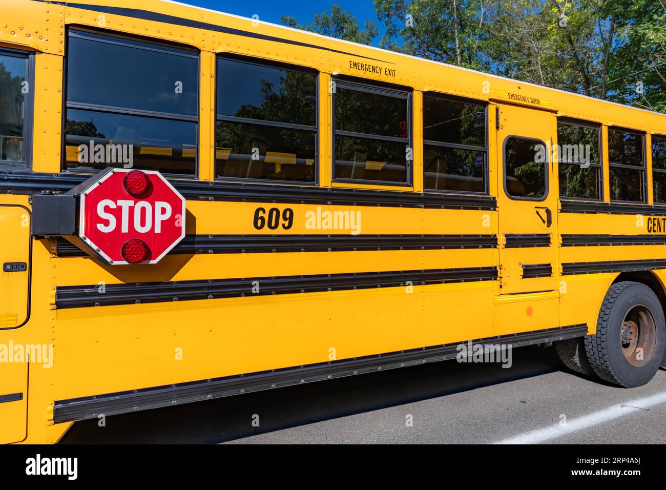 Side of a parked yellow school bus number 609 Stock Photo - Alamy