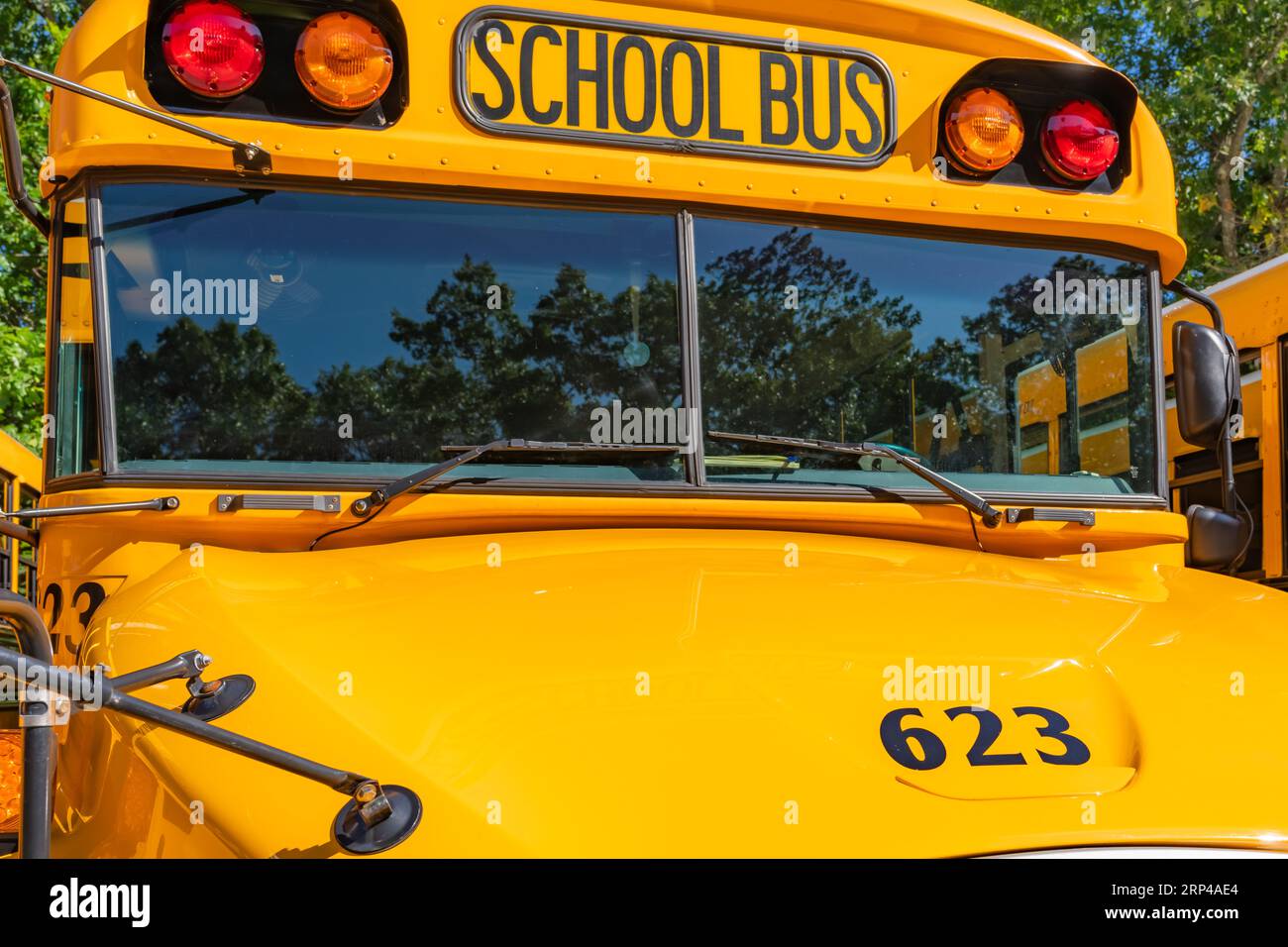 Front of a parked yellow school bus number 623 Stock Photo - Alamy