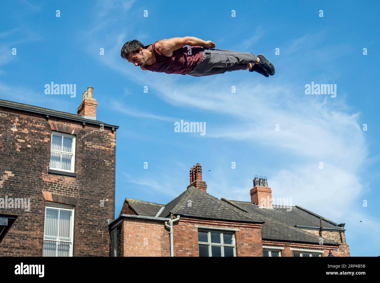 An acrobat from contemporary circus Tripotes la Compagnie during a ...