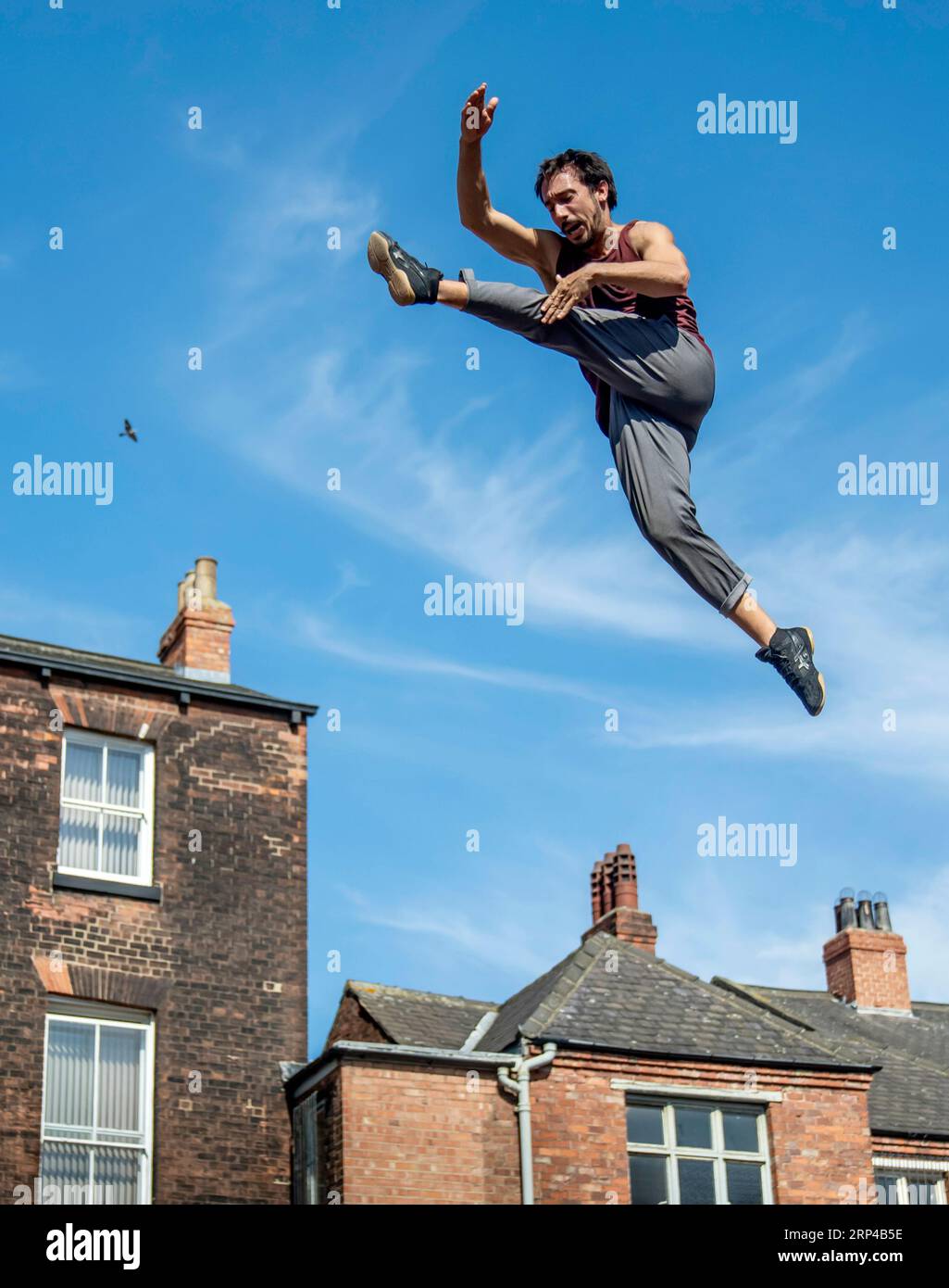 An acrobat from contemporary circus Tripotes la Compagnie during a ...