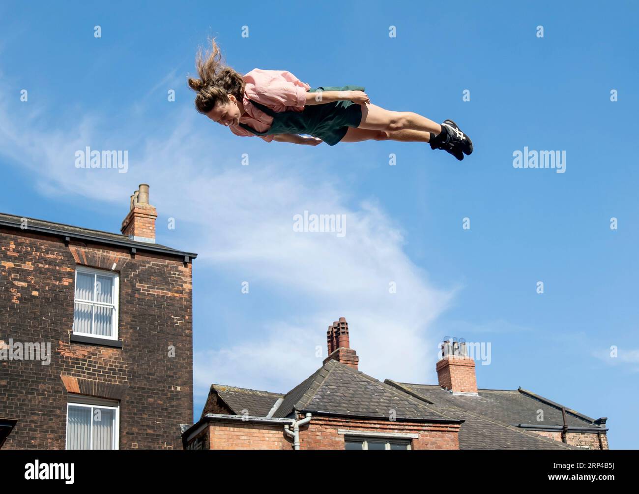 An acrobat from contemporary circus Tripotes la Compagnie during a ...