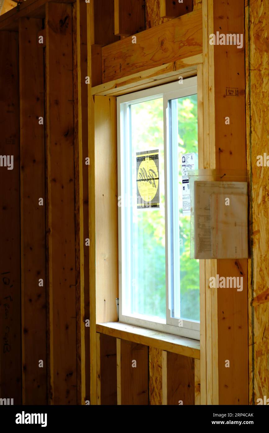 window and interior wall of new home construction Stock Photo - Alamy