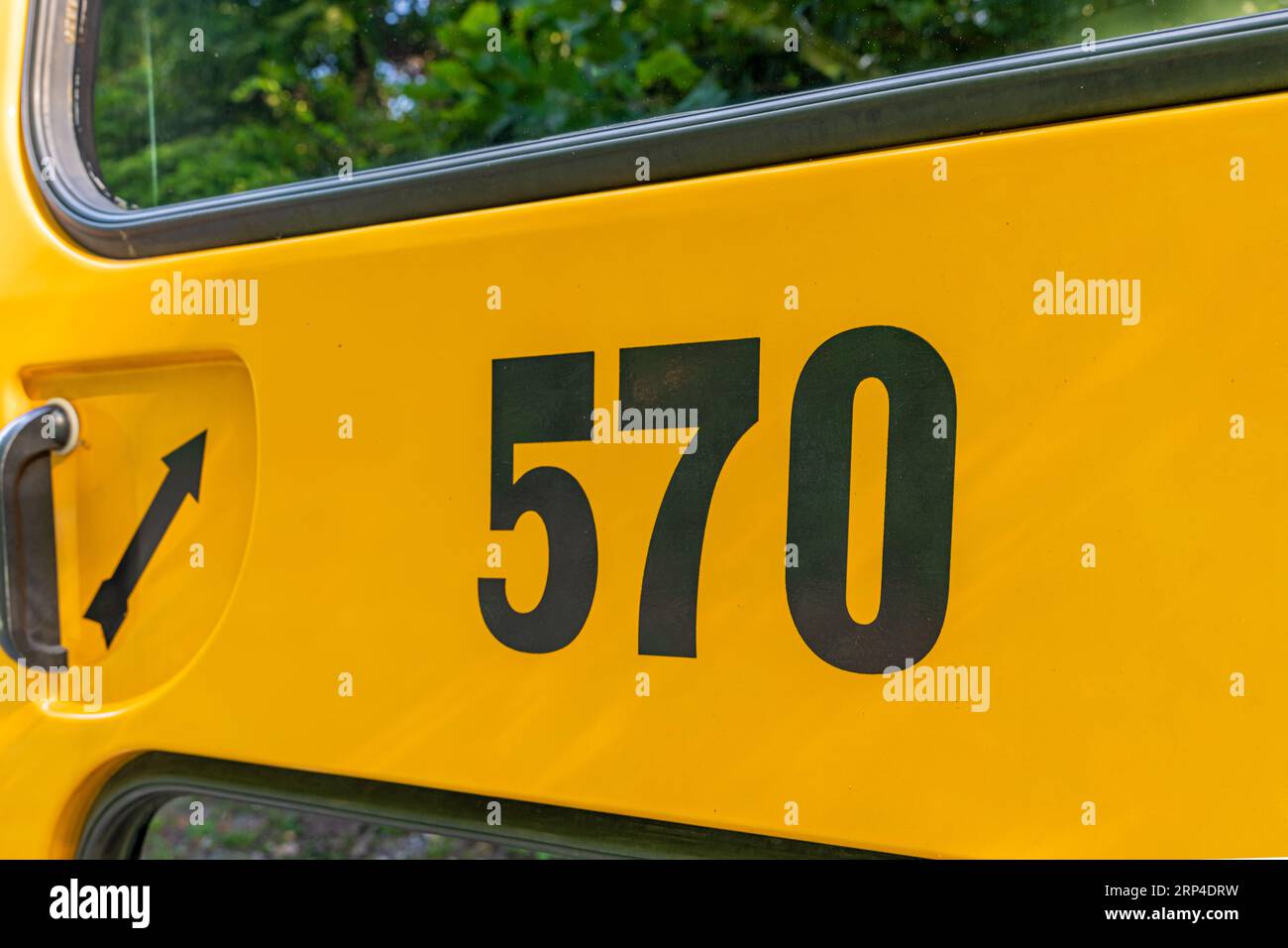 rear of a parked yellow school bus number 670 Stock Photo - Alamy