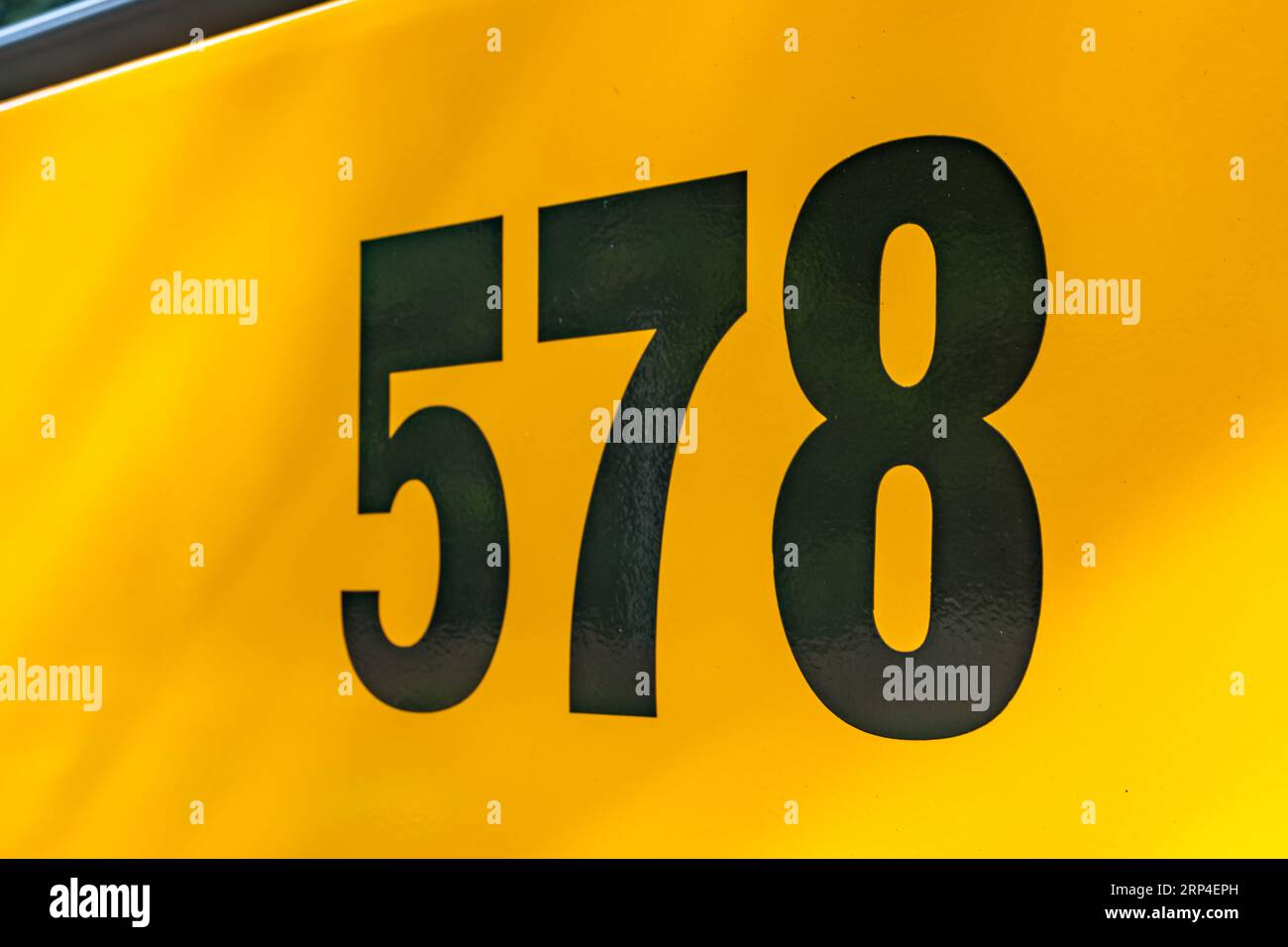 rear of a parked yellow school bus number 678 Stock Photo - Alamy