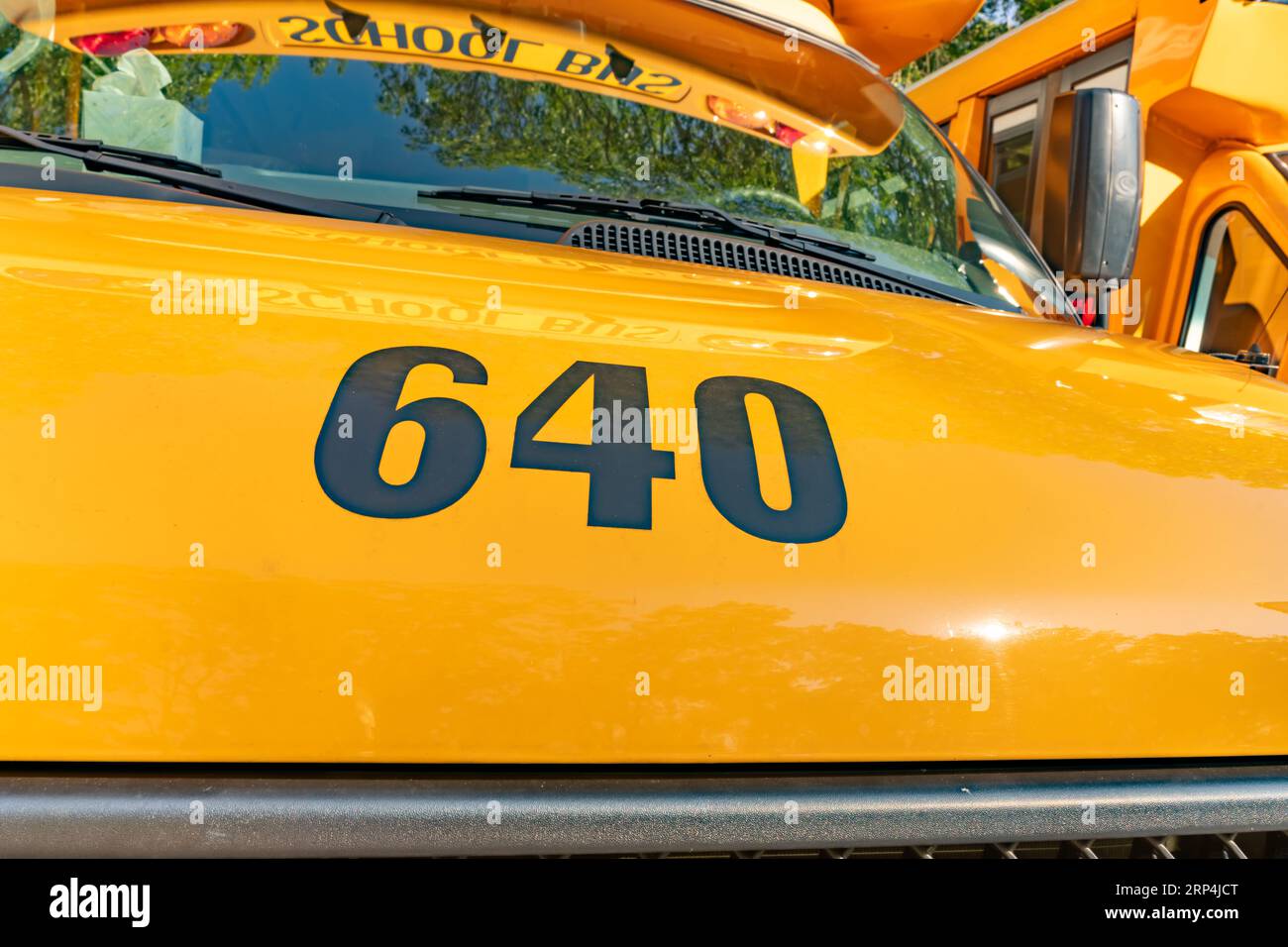 Front of a parked yellow school bus number 640 Stock Photo - Alamy