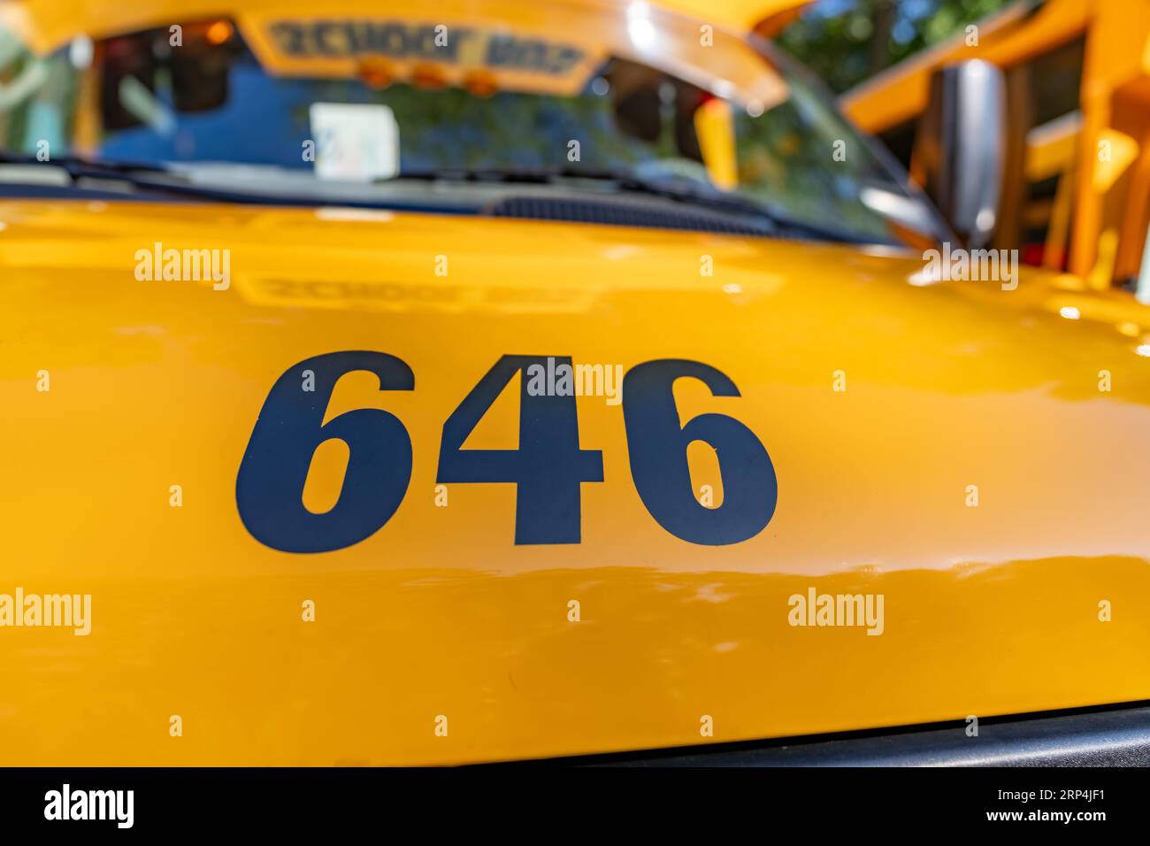 Front of a parked yellow school bus number 646 Stock Photo - Alamy