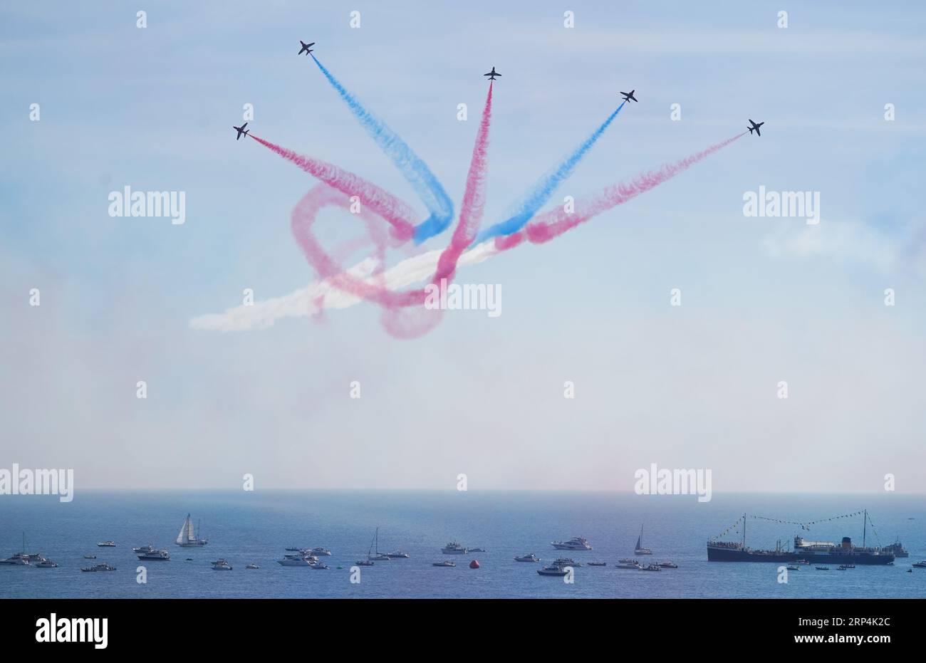 The RAF Red Arrows display team perform over the sea at the Bournemouth ...