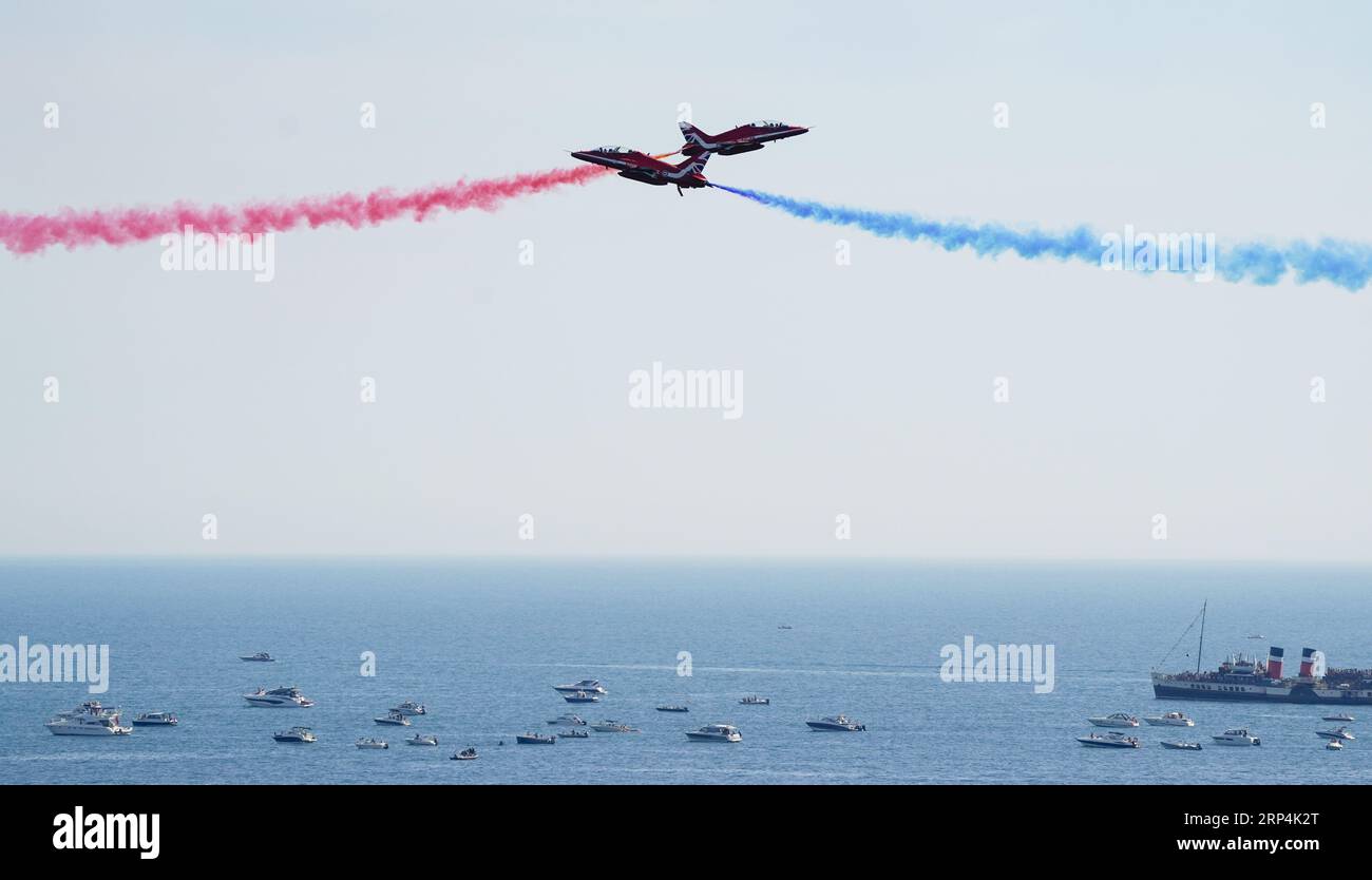The RAF Red Arrows display team perform over the sea at the Bournemouth ...