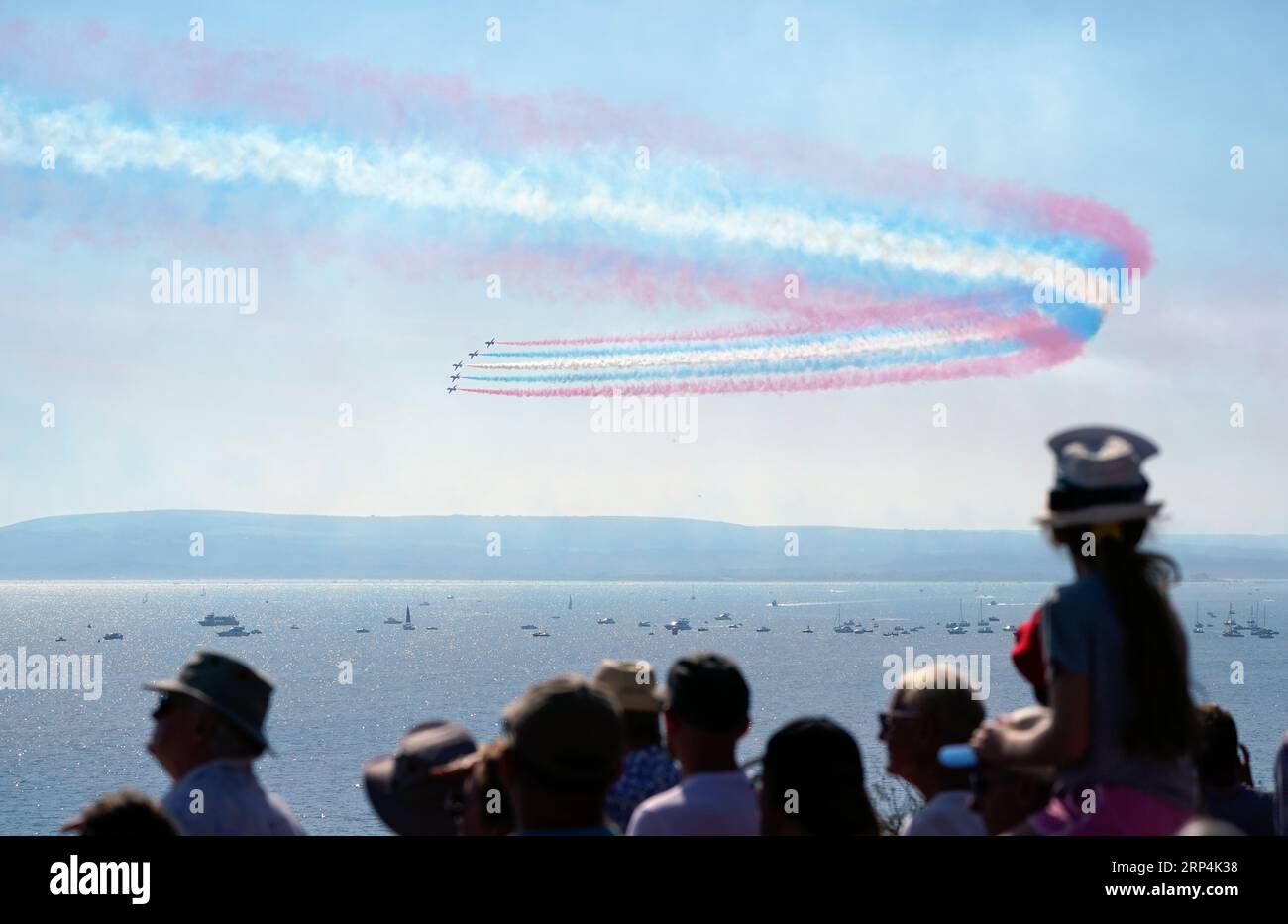 The RAF Red Arrows display team perform over the sea at the Bournemouth ...