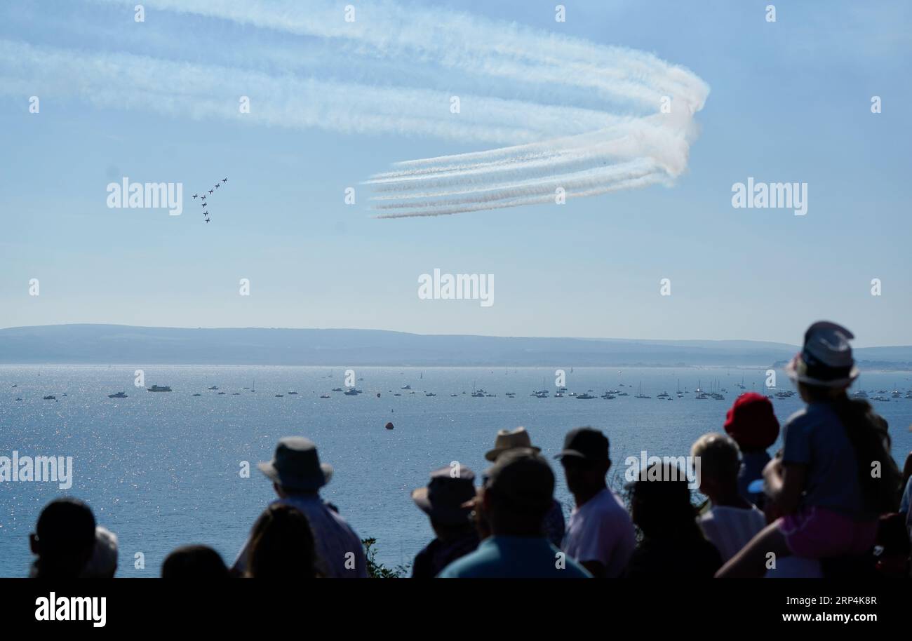The RAF Red Arrows display team perform over the sea at the Bournemouth ...