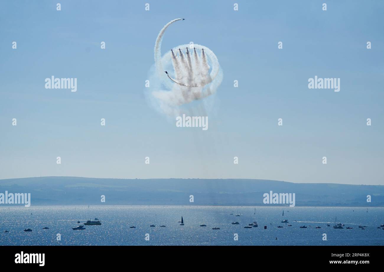 The RAF Red Arrows display team perform over the sea at the Bournemouth ...