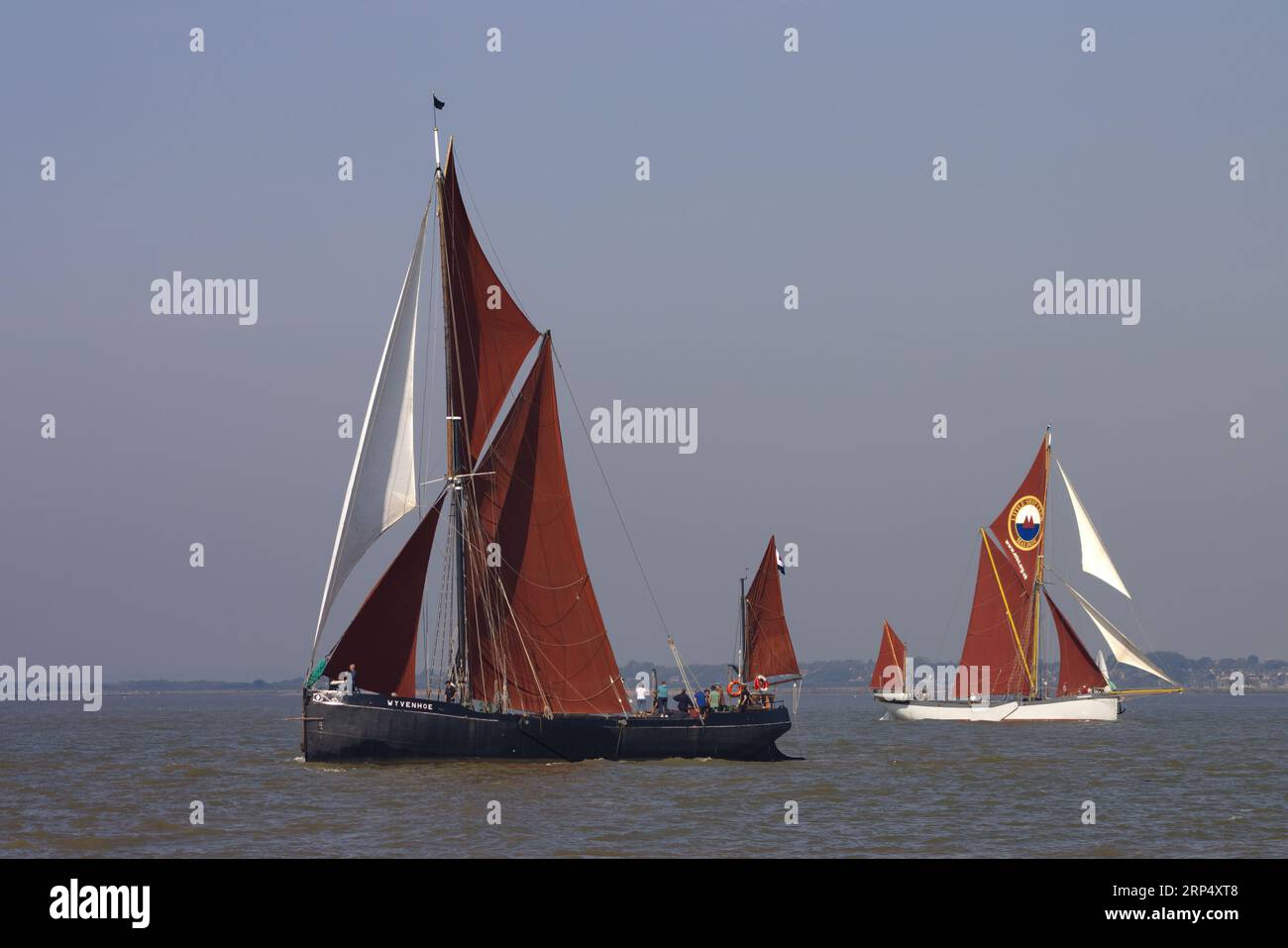 The Thames sailing barge Wyvenhoe in full sail, with Blue Mermaid in ...