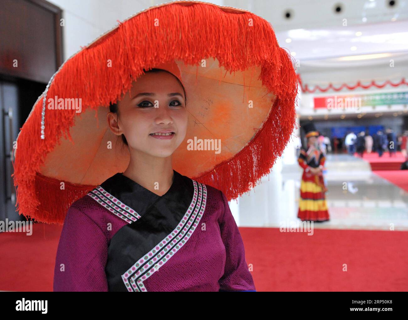 Zhuang people in traditional costume hi-res stock photography and ...