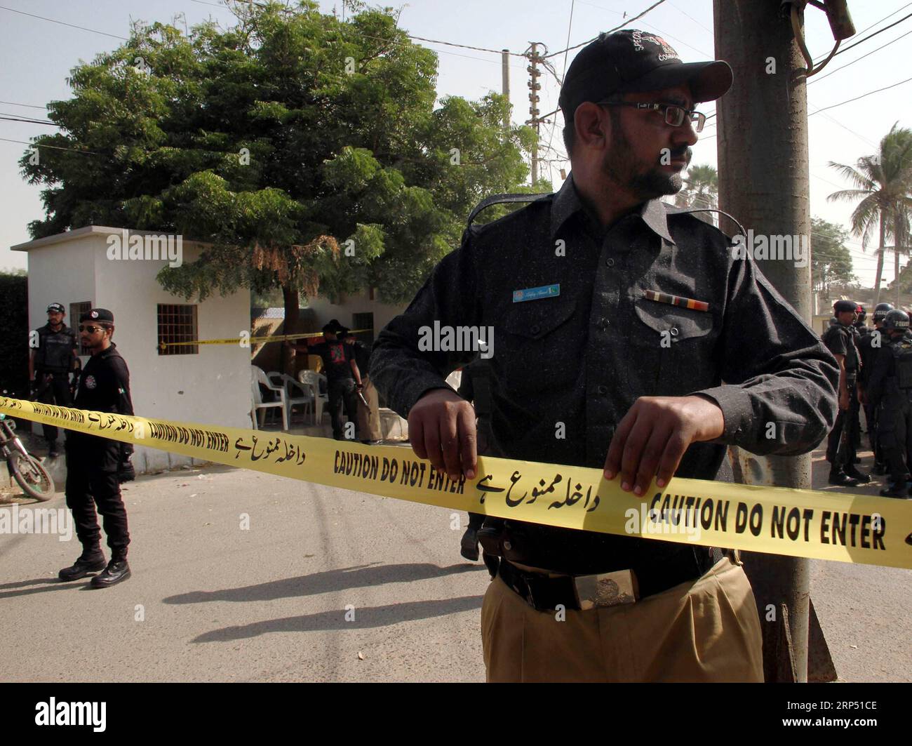 Police officials cordon off hi-res stock photography and images - Alamy