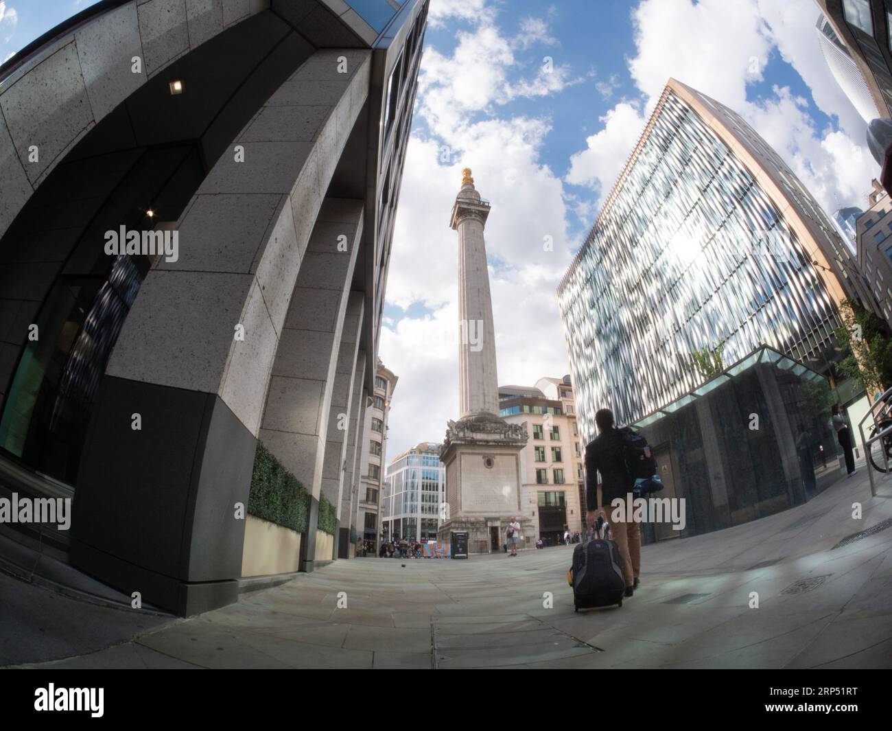 The Monument to the Great Fire of London in centre of frame, and on ...