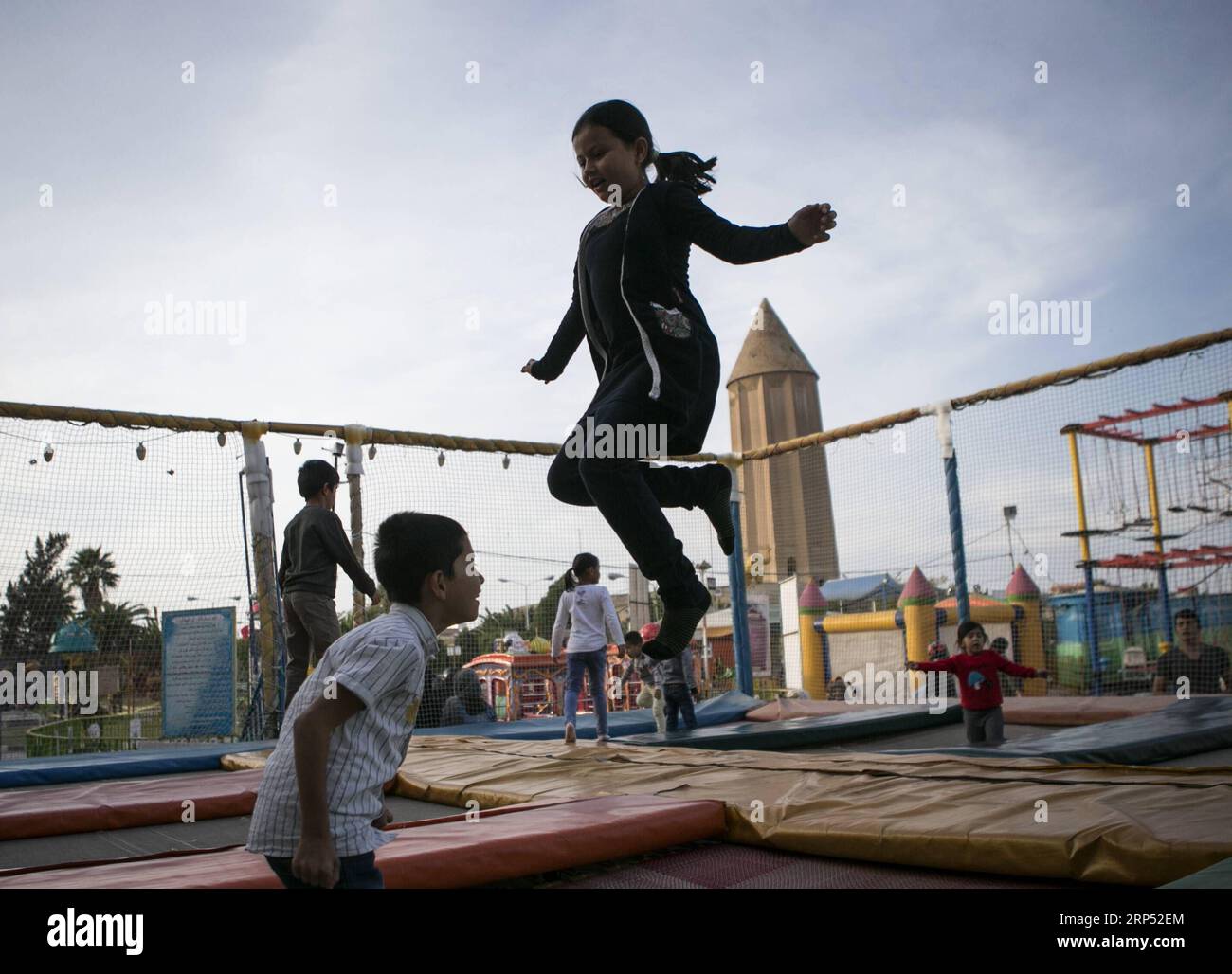 (181124) -- GONBAD-E KAVOUS, Nov. 24, 2018 -- Children play at a park ...