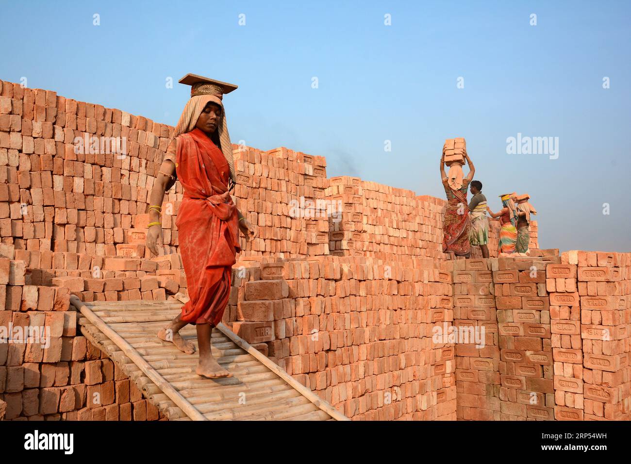 Brick factory where the heavy work is mainly done by women, North 24 ...