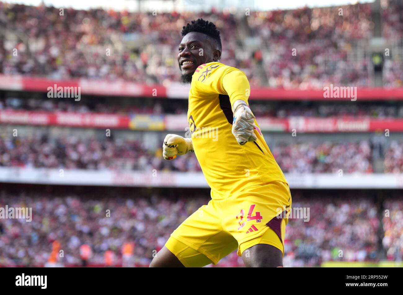 Manchester United goalkeeper Andre Onana celebrates their side's first ...