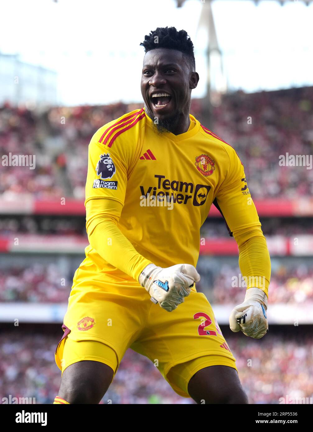 Manchester United goalkeeper Andre Onana celebrates their side's first ...